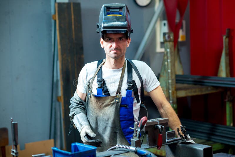 Welder in factory stock photo. Image of construction - 82673196