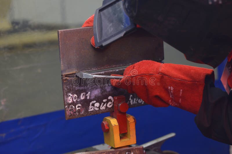 Welder Hands Preparing Two Pieces of Metal for Welding Using Hammer ...