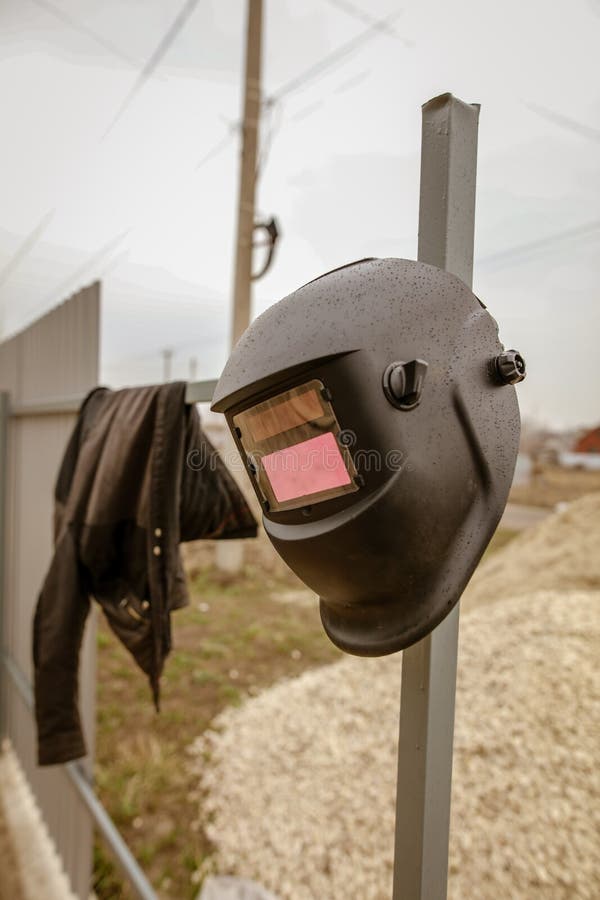 Welder Helmet at the Construction Site Stock Image - Image of equipment ...