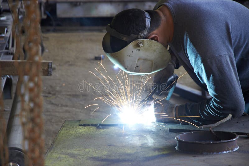Welder Makes a Velding Metal Structure Sparks in a Workshop Stock Image ...