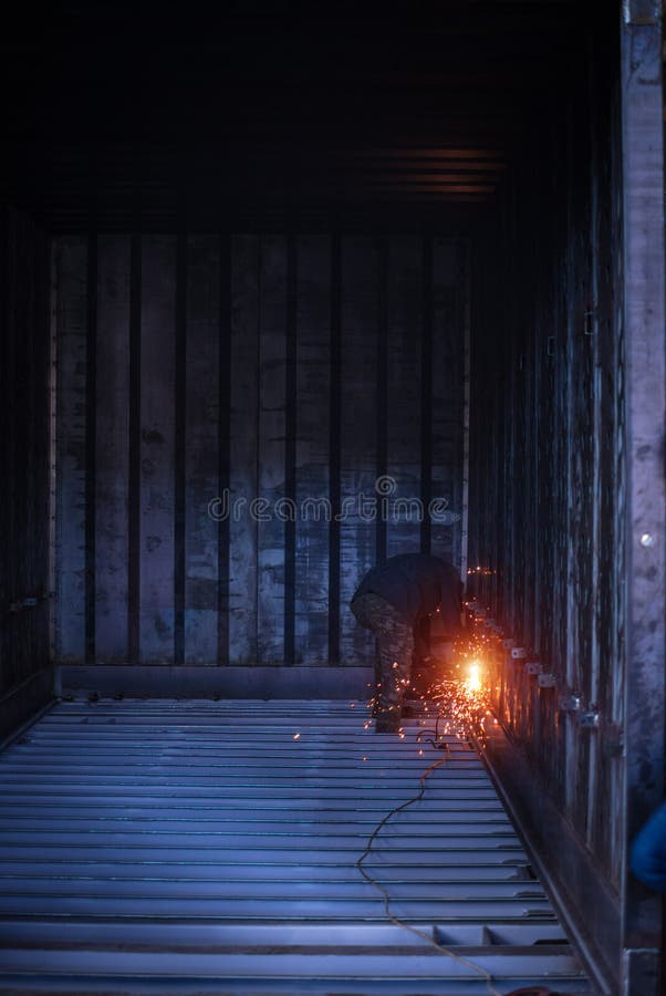 Welder Makes Welding Inside an Iron Container Stock Image - Image of ...