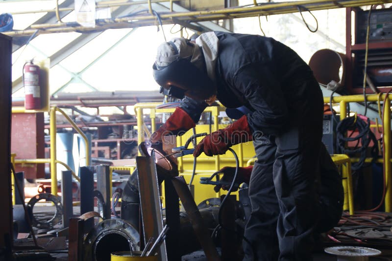 Welder Man Welding Reduce Pipe Stock Photos - Free & Royalty-Free Stock ...
