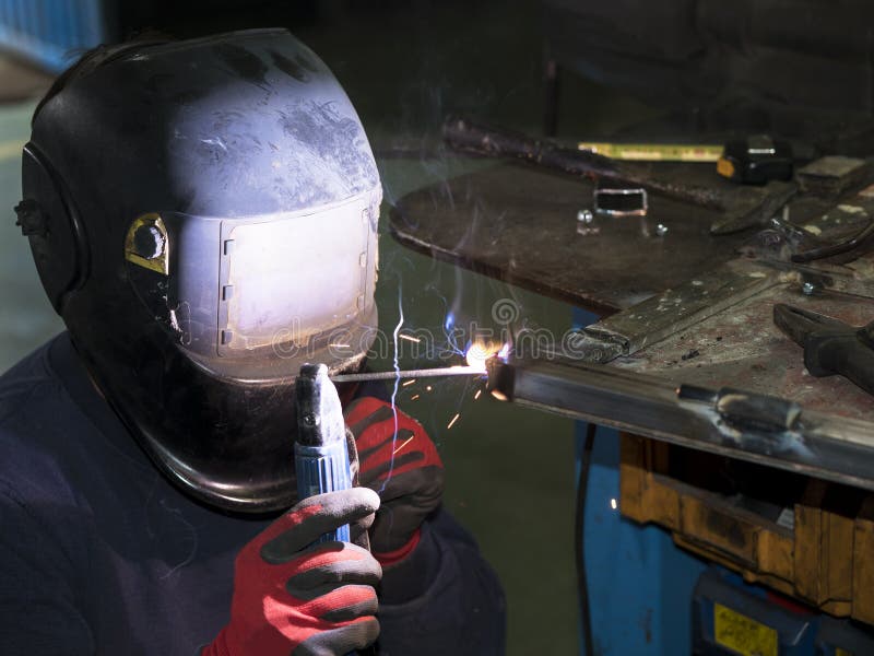 Welder Mechanic Fabricating a Metal Door Stock Image - Image of workman ...