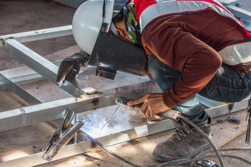 The Welder in the Operate,Employee Welding U-steel Using Welder Machine ...