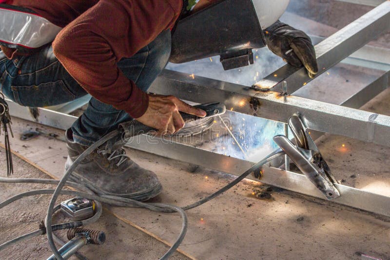 The Welder in the Operate,Employee Welding U-steel Using Welder Machine ...