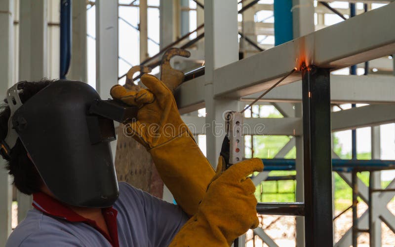 Welder in Position Over Head Action. Stock Photo - Image of industrial ...
