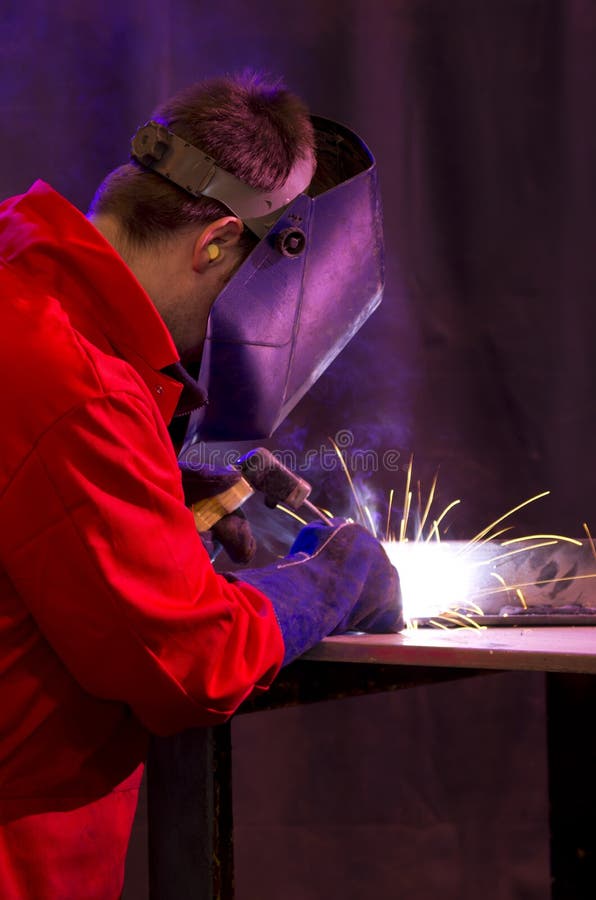 Red welder stock photo. Image of skill, spray, tech, laborer - 2302688