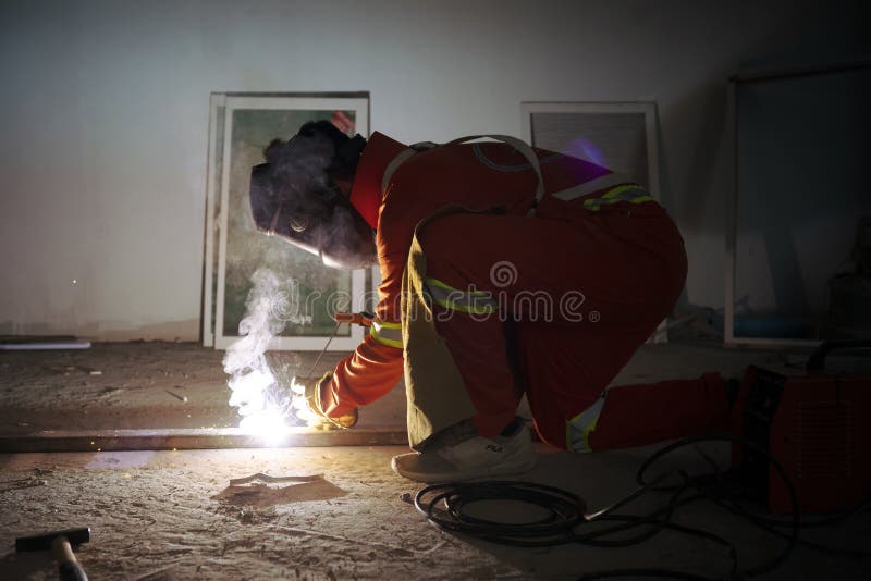 Welder with safety dress stock photo. Image of skilled - 145356990