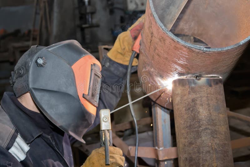 Welder in the Shop Weld of the Sample Insert Tube into the Pipe Stock ...