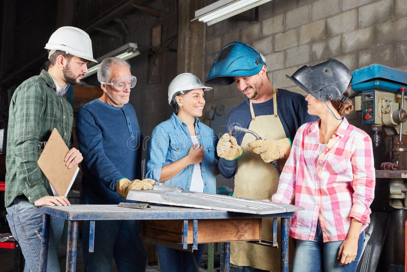 Welder Team of Workers with Instructor Stock Photo - Image of workshop ...