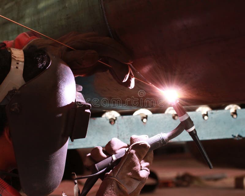 Welder is Welding at the Big Column with MIG Method Stock Image - Image ...