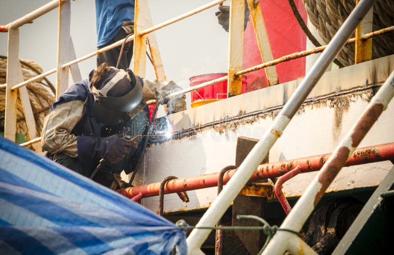 Welder welding bridge pier stock photo. Image of repair - 27633604