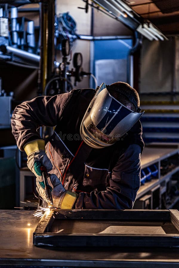 A Welder Welding in Factory Stock Image - Image of industrial, machine ...