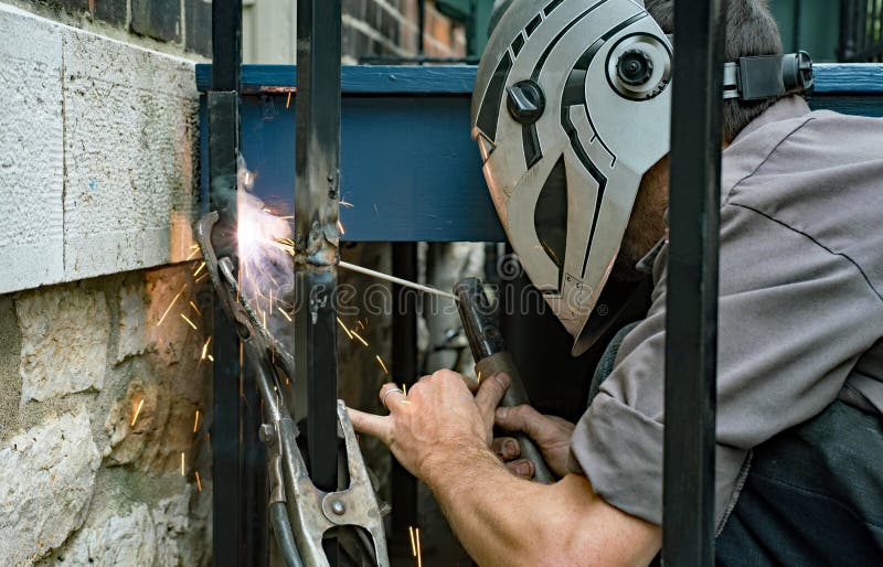 Welder Welding Iron Post stock image. Image of fire - 101964599