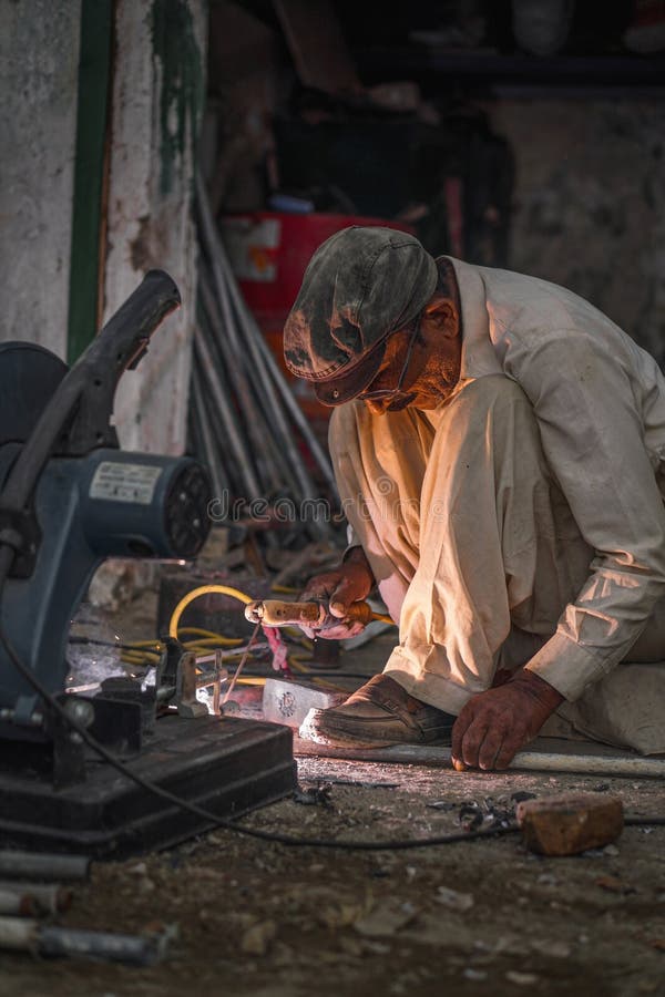 Welder Welding Metal in His Workshop Stock Photo - Image of pakistani ...
