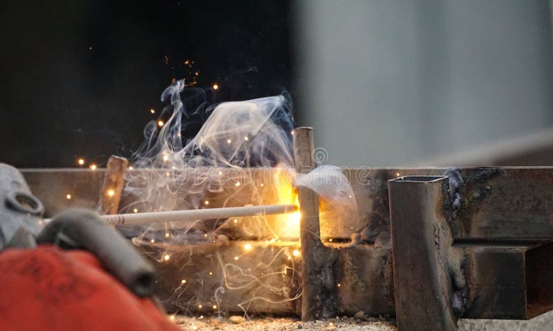 Welder is Welding Metal Part on a Construction Site Stock Photo - Image ...
