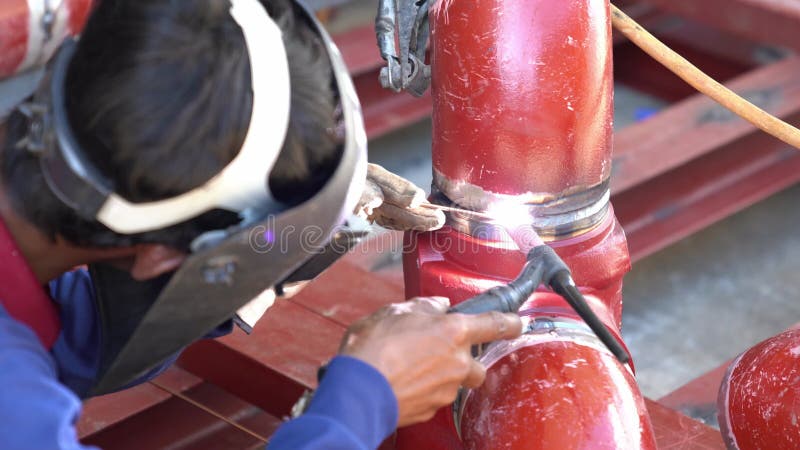 Welder is Welding Metal Pipe Inert Gas Welding. Stock Footage - Video ...
