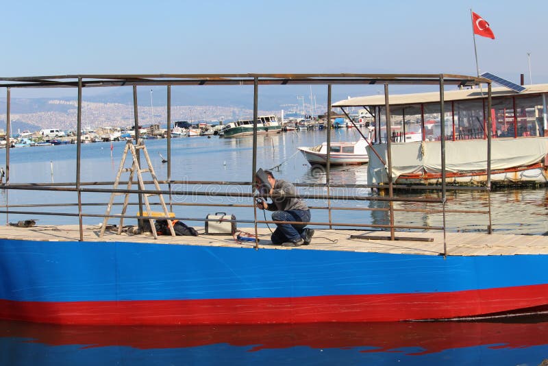 A Welder is Mending the Ship Stock Image - Image of welder, wearing ...