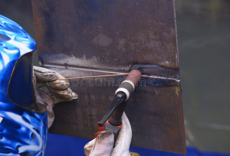 Welder Welding Two Pieces of Metal Using Argon Torch and Filler Rod ...