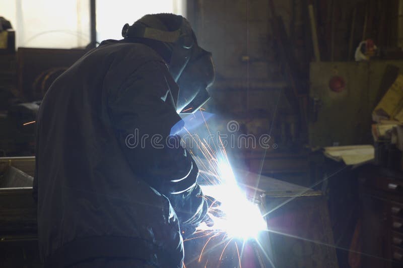 Welder at work stock image. Image of smoke, helmet, mask - 1850661