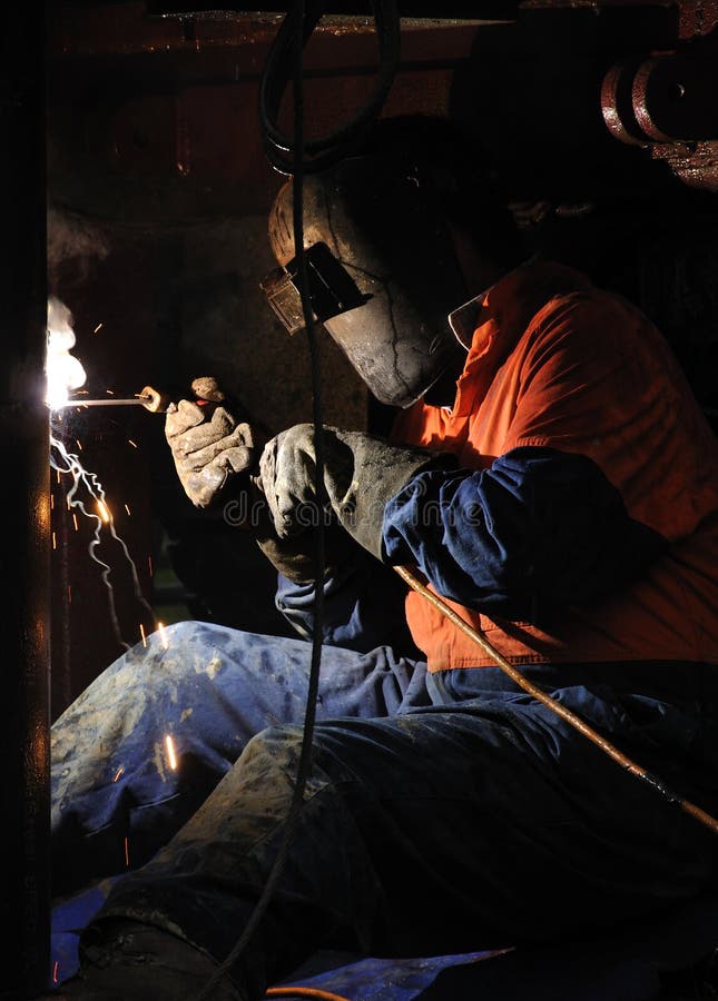 Welder at work stock image. Image of helmets, wells, pipes - 22280427