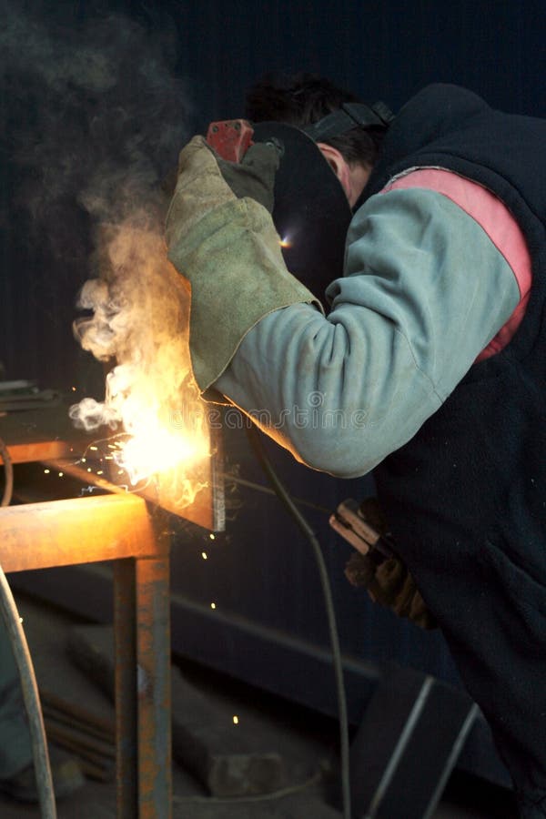 Welder at work stock image. Image of metal, dark, safety - 3405047