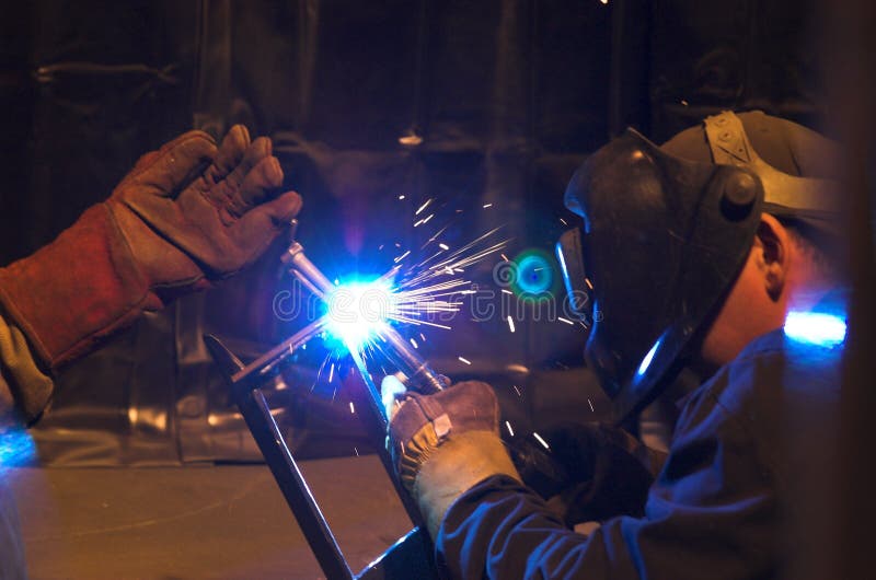 Welderman stock image. Image of dazzle, helmet, build - 5042835