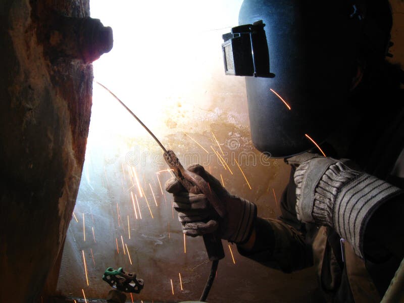 Welder at work stock image. Image of equipment, weld, metal - 5834337
