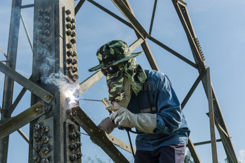 Welder Work at High Electric High Voltage Pole 230 Kv. Editorial Stock ...