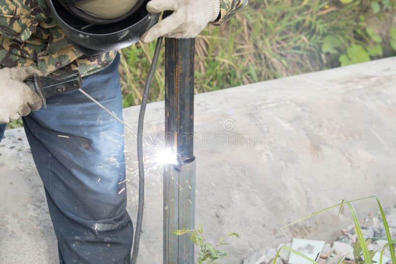 Installation of a Metal Column Using a Welding Machine Stock Image ...