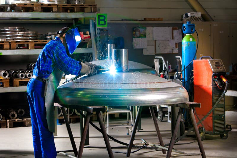 Welder at Work in the Plant Editorial Image - Image of mask, components ...