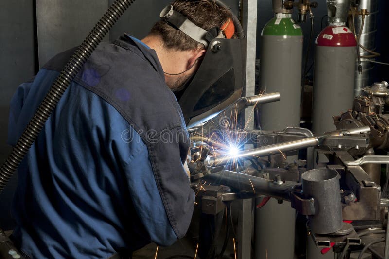 Welder at work stock photo. Image of manufacturer, repairman - 66212136