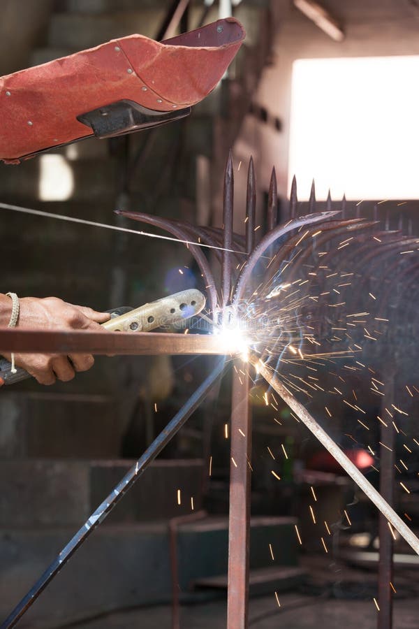 Welder at work stock photo. Image of metal, welding, weld - 33121362