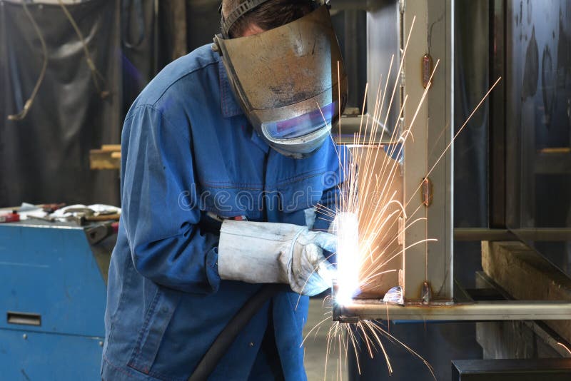 Welder at Work in a Steel Construction Company - Working and Protective ...