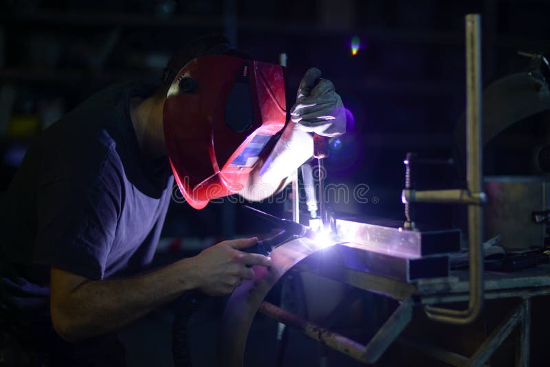 Welder at Work, Using a Tig Handle. Stock Photo - Image of ...