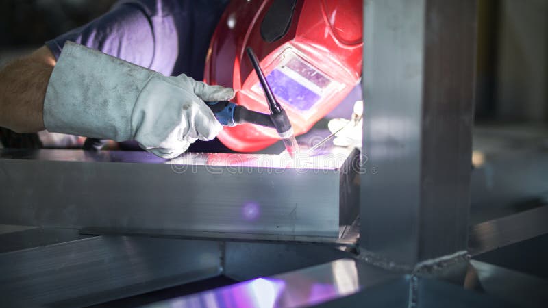 Welder at Work, Using a Tig Handle. Stock Photo - Image of craftsman ...