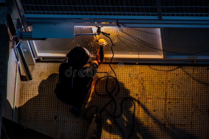 Welder at Work at a Metal Gate Top View Stock Image - Image of sparks ...