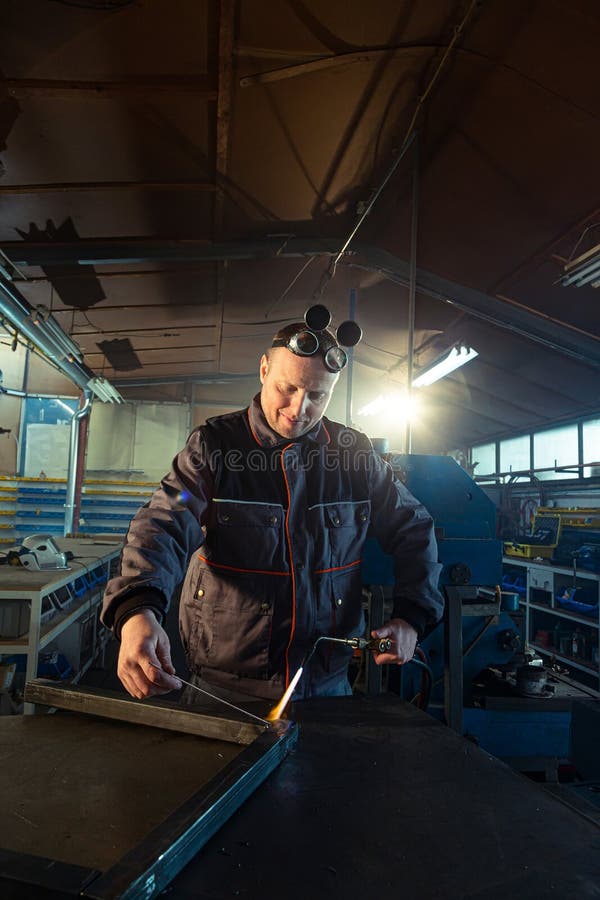 Welder Working with Autogenous Welding Tool in Workshop Stock Photo ...