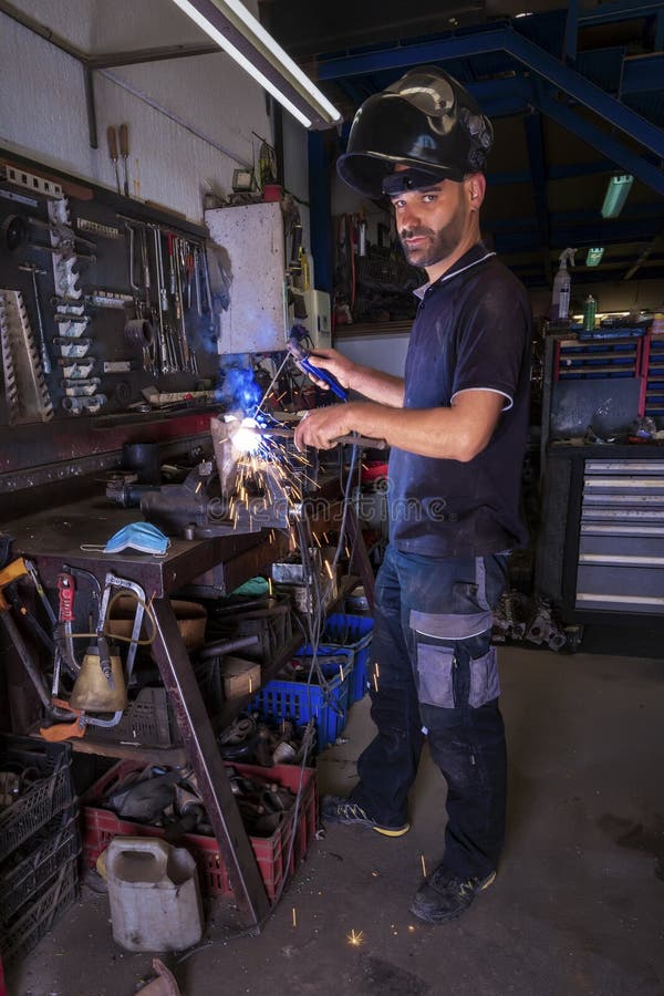 Welder Working with Electric Lance in the Workshop. Stock Image - Image ...