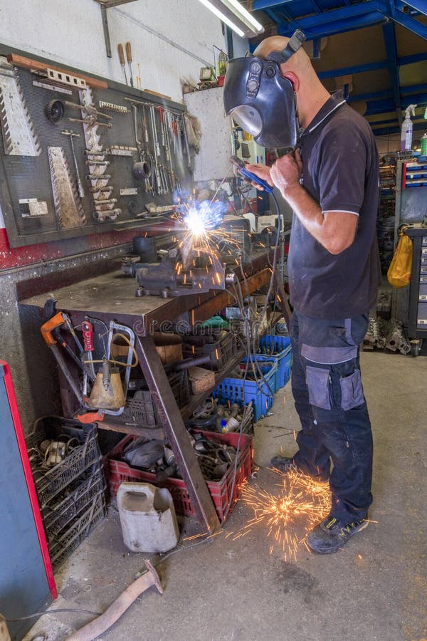 Welder Working with Electric Lance in the Workshop. Stock Image - Image ...