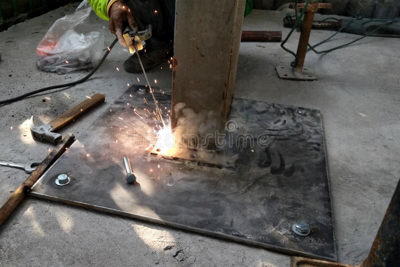 Welder Working with Electrode at Arc Welding in Construction Sit Stock ...