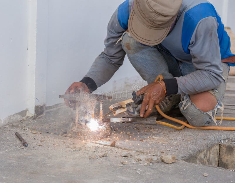 Welder Working a Welding Metal. Stock Photo - Image of equipment ...