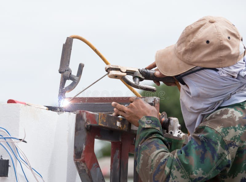 Welder Working a Welding Metal. Stock Image - Image of fumes ...