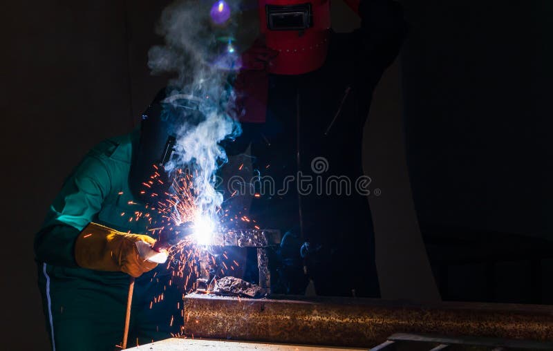 The welder is working stock photo. Image of light, protection - 181263296