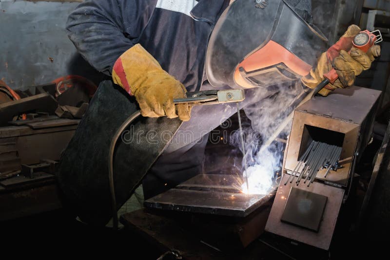 Welder in Workshop Conditions Sample Weld from Sheet Metal To Un Stock ...