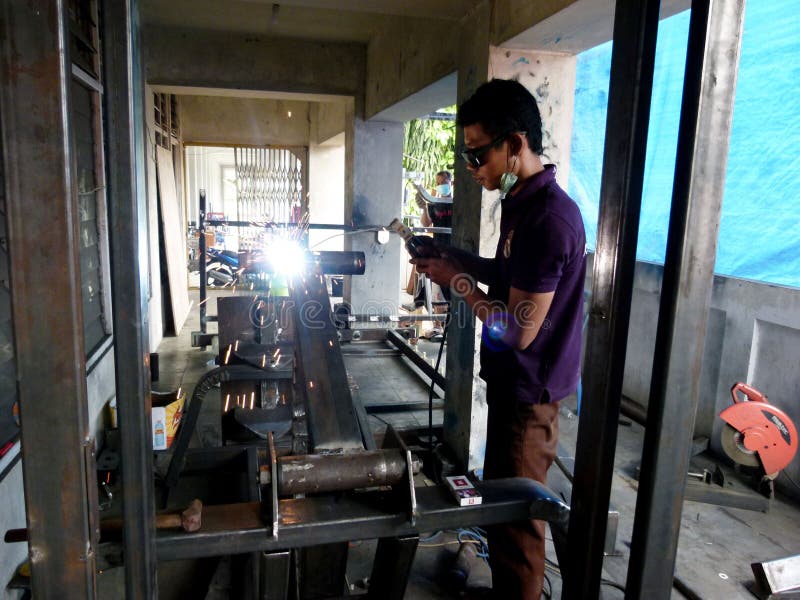 Welders editorial stock photo. Image of fitness, welders - 66823278