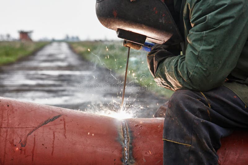 A Construction Worker Welding Steel Bars. Stock Image - Image of ...