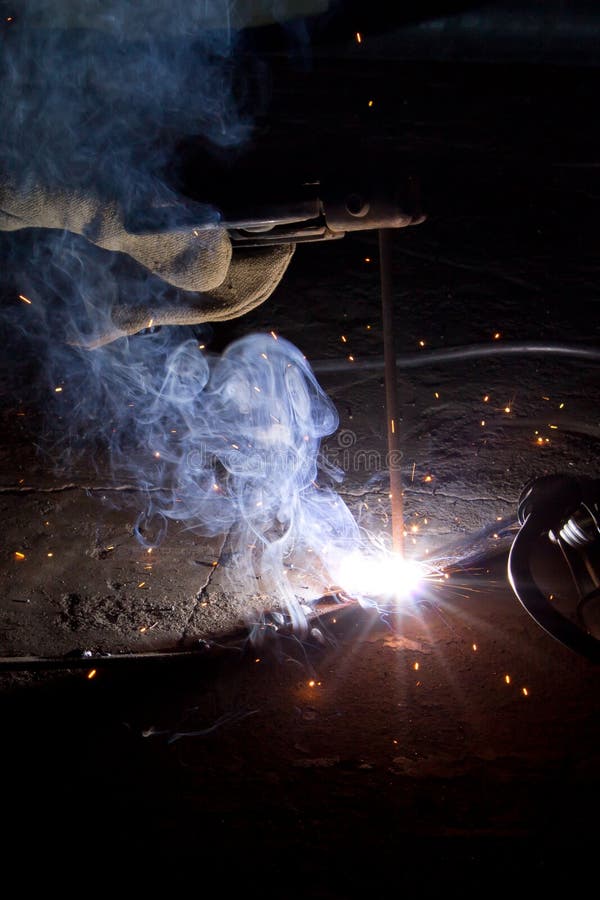 Welding in action stock photo. Image of action, bright - 87735750
