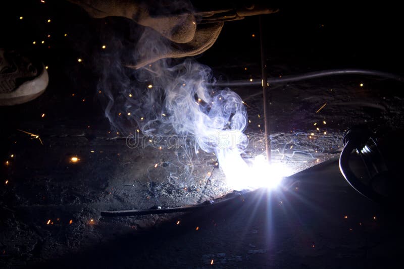 Welding in action stock photo. Image of light, metal - 87735766