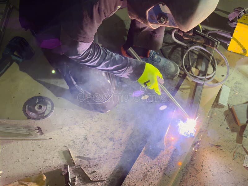 Welding with Argon or Electrode, Using a Welding Machine. Stock Photo ...